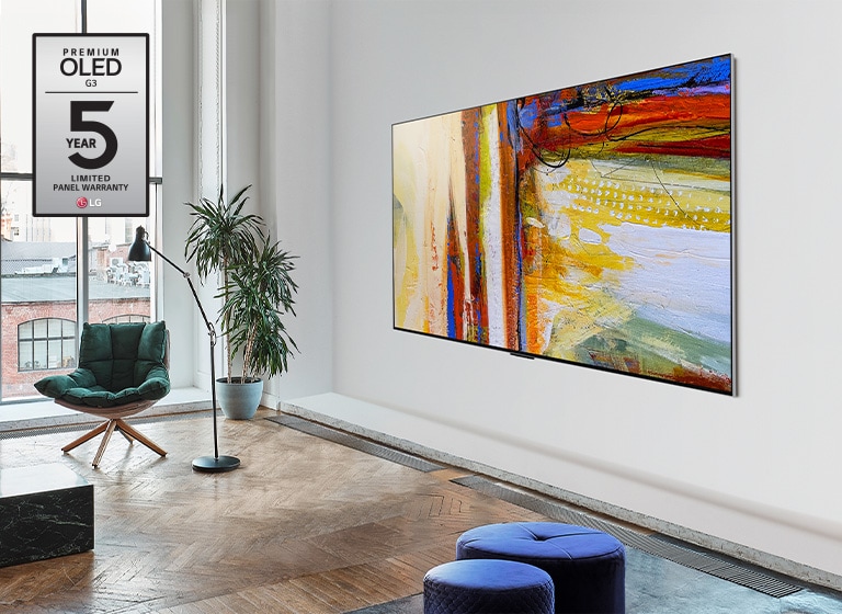 Et bilde av LG OLED G3 som viser et fargerikt abstrakt kunstverk i et lyst og livlig rom.